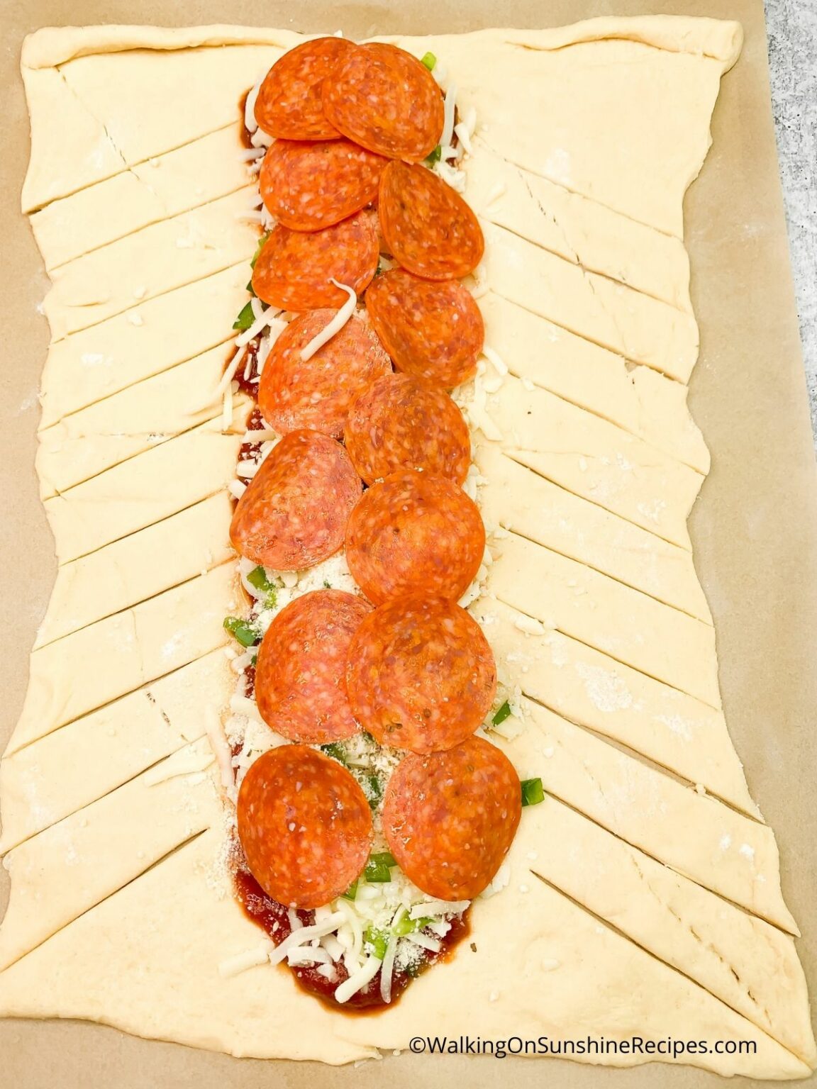 Crescent Roll Pizza Braid - Walking On Sunshine Recipes